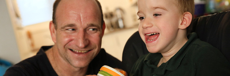 Michael has spina bifida and here he is with his dad David - Northcott